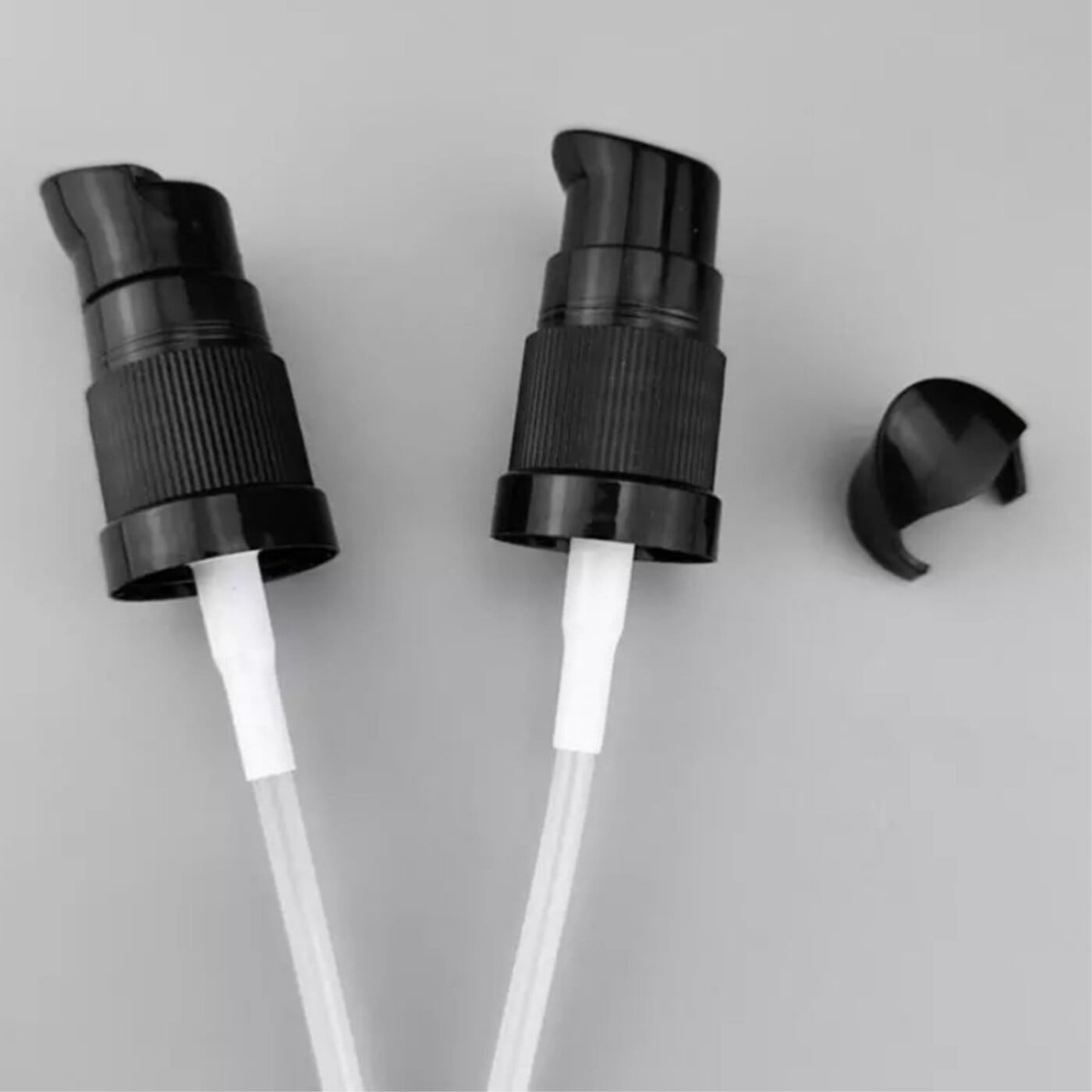 Transform Your Packaging with 18mm Lotion Pump Cap Duck - Shop Now!